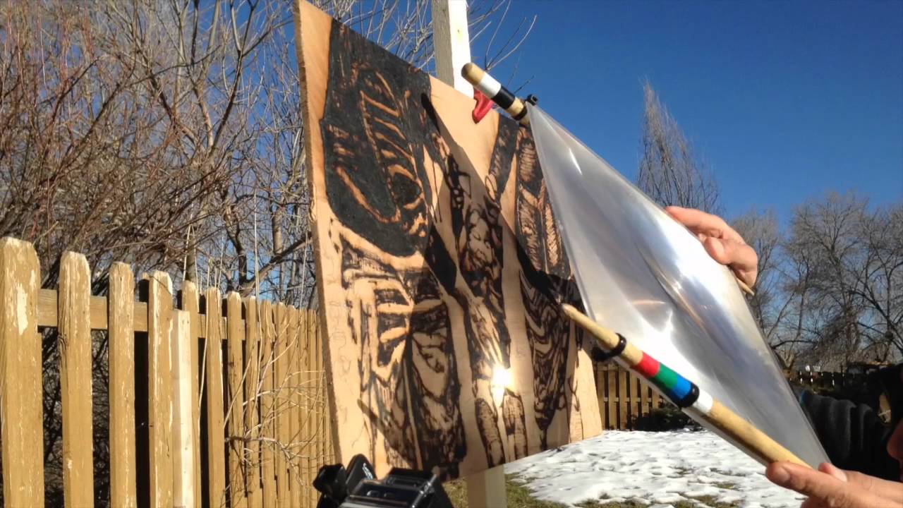 Artist Paints with the Sun Using Magnifying Glass as His Brush