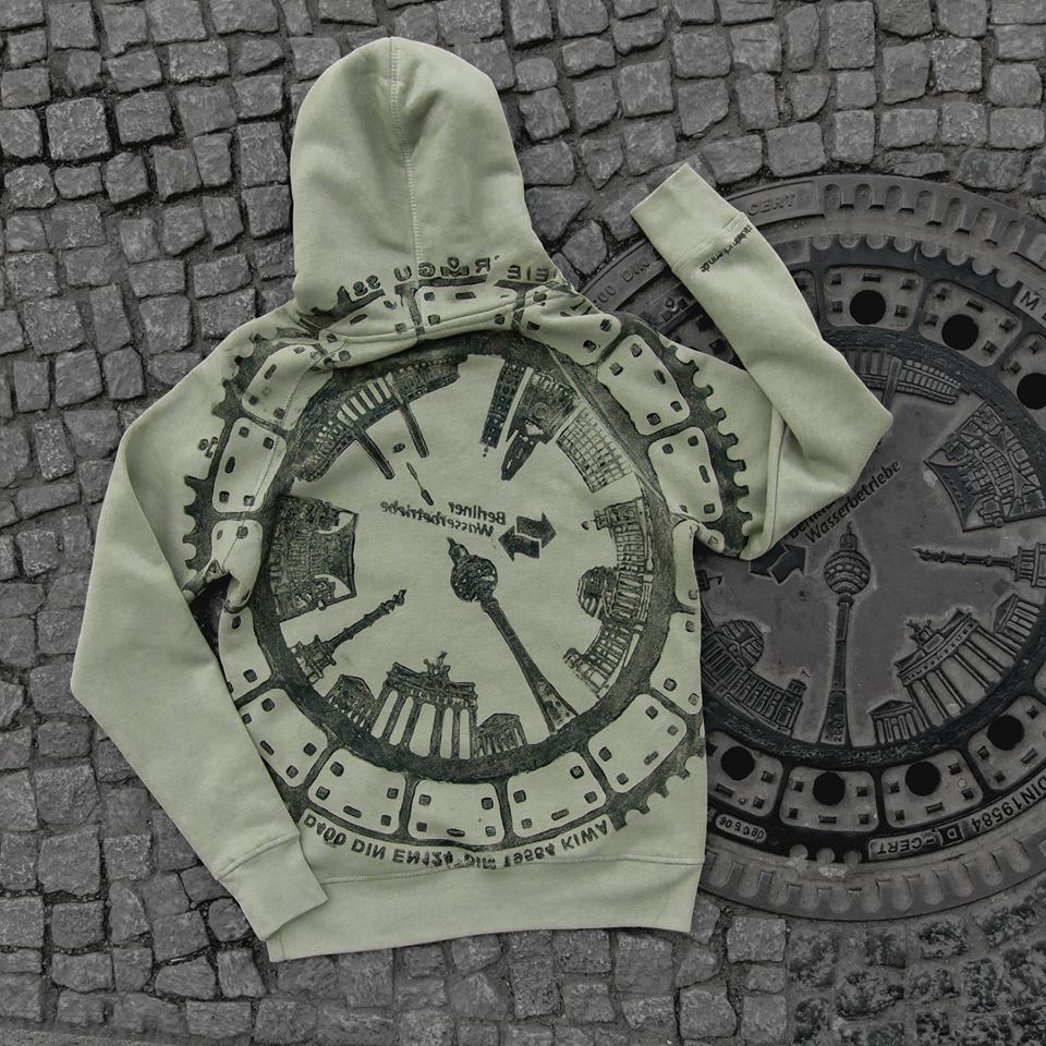 German Art Collective Prints Fashionable Clothes Directly on Manhole Covers
