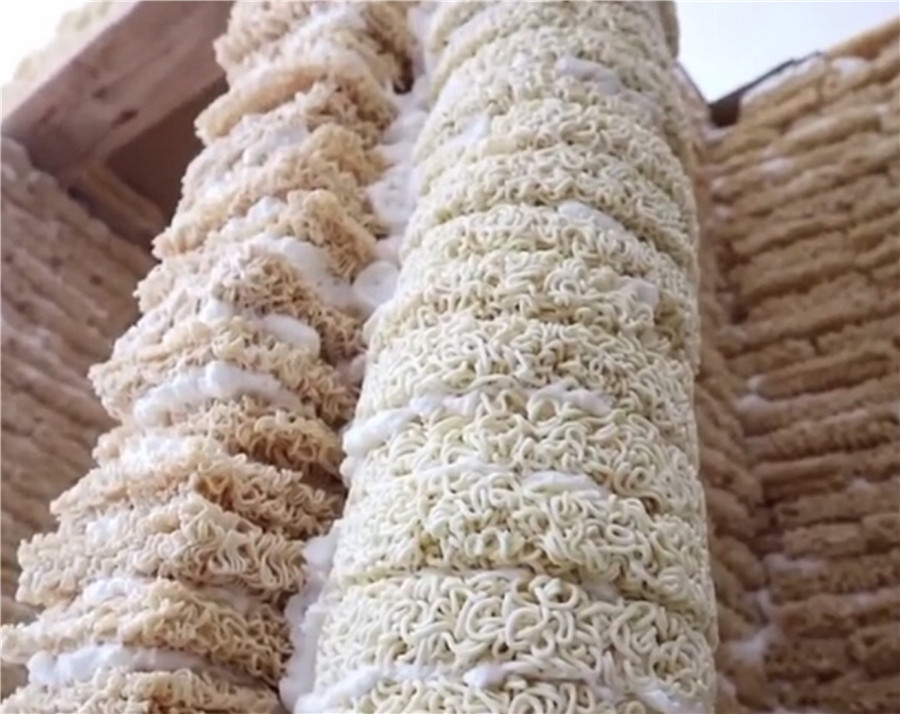 Man Builds Children's Playhouse Out of 2,000 Packets of Instant Noodles